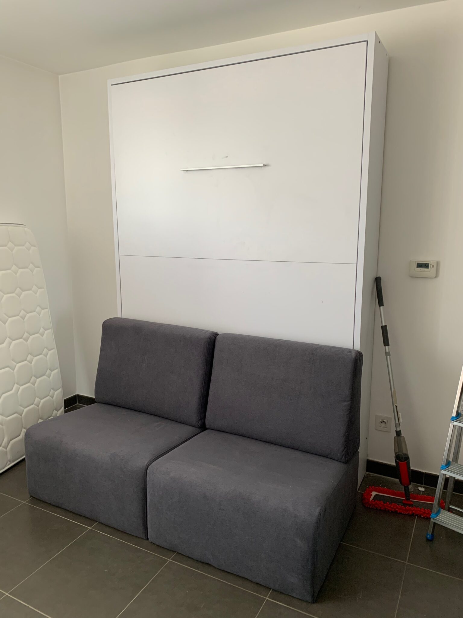 Montage lit escamotable